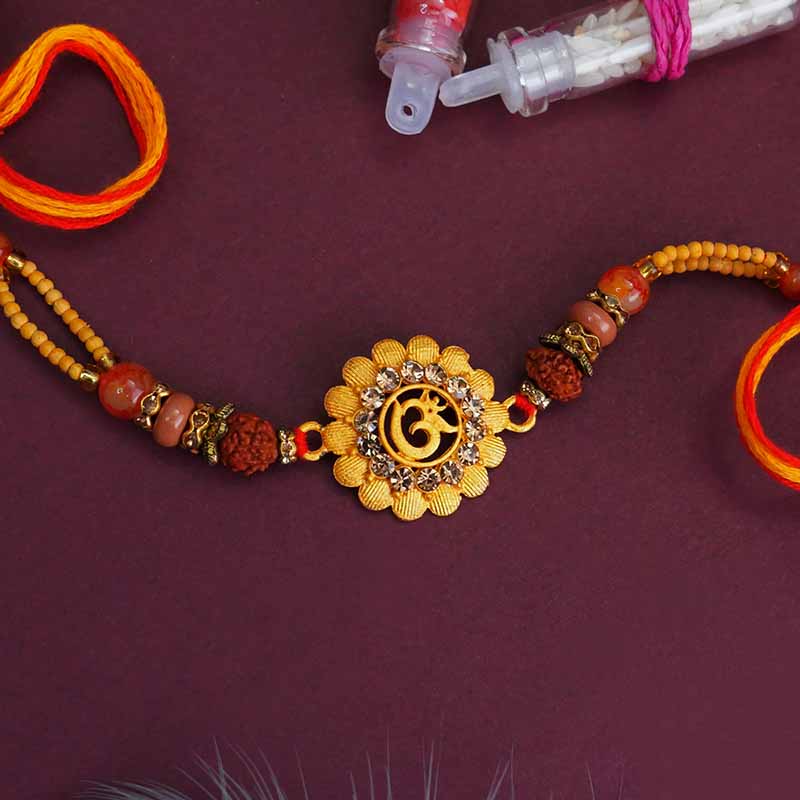Send Golden Om Rakhi Online | Rakhibazaar.com