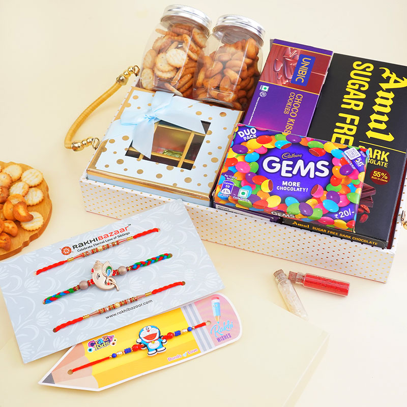 Send Set of Four Rakhis with Chocolates N Cookies Gift Pack Online ...
