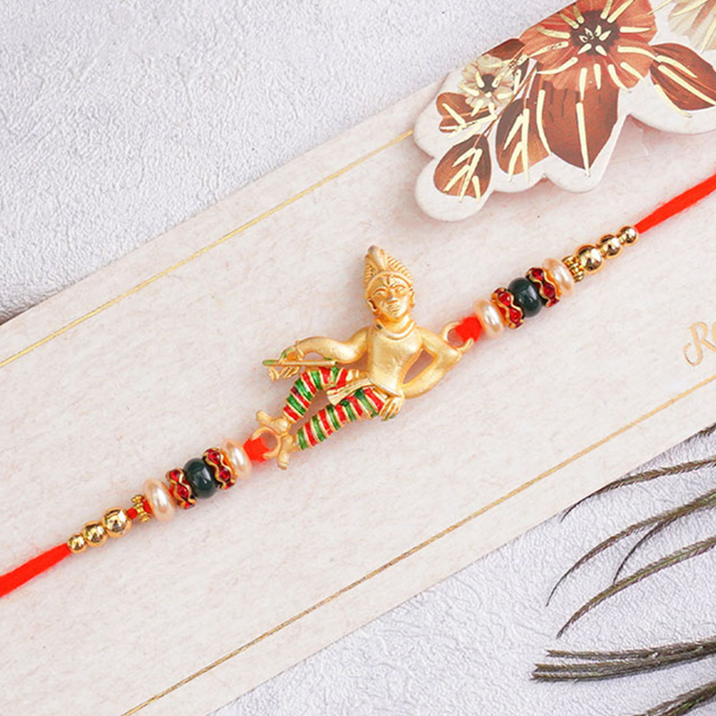 Send Gleaming Golden Krishna Rakhi Online | Rakhibazaar.com