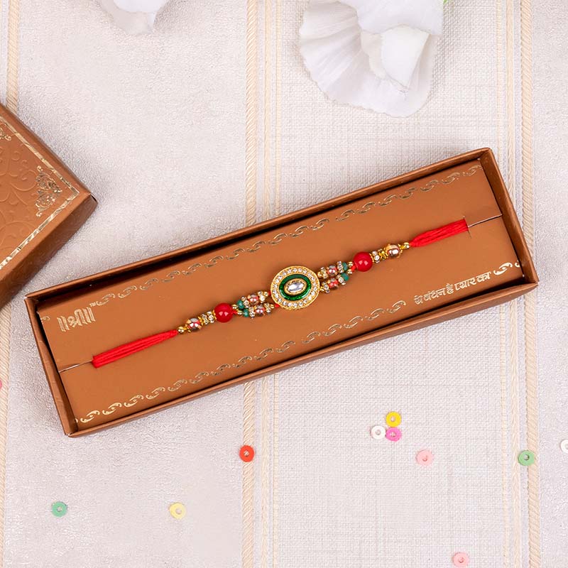 Send AD Rakhi with Haldiram Sweet Box Online | Rakhibazaar.com