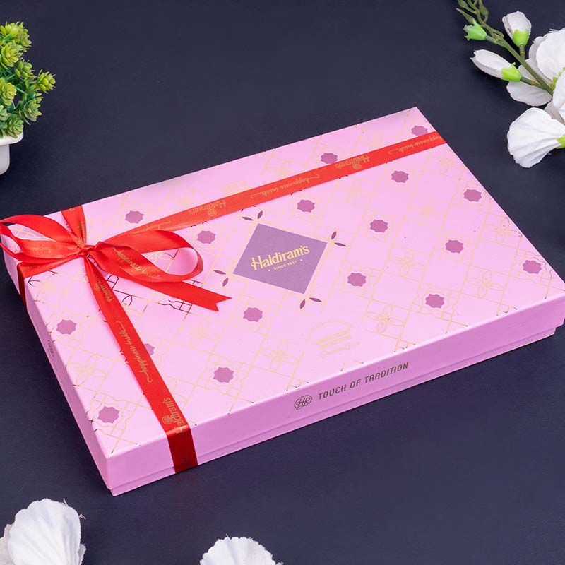 Send Rudraksha Rakhi with Haldiram Sweet Box Online | Rakhibazaar.com